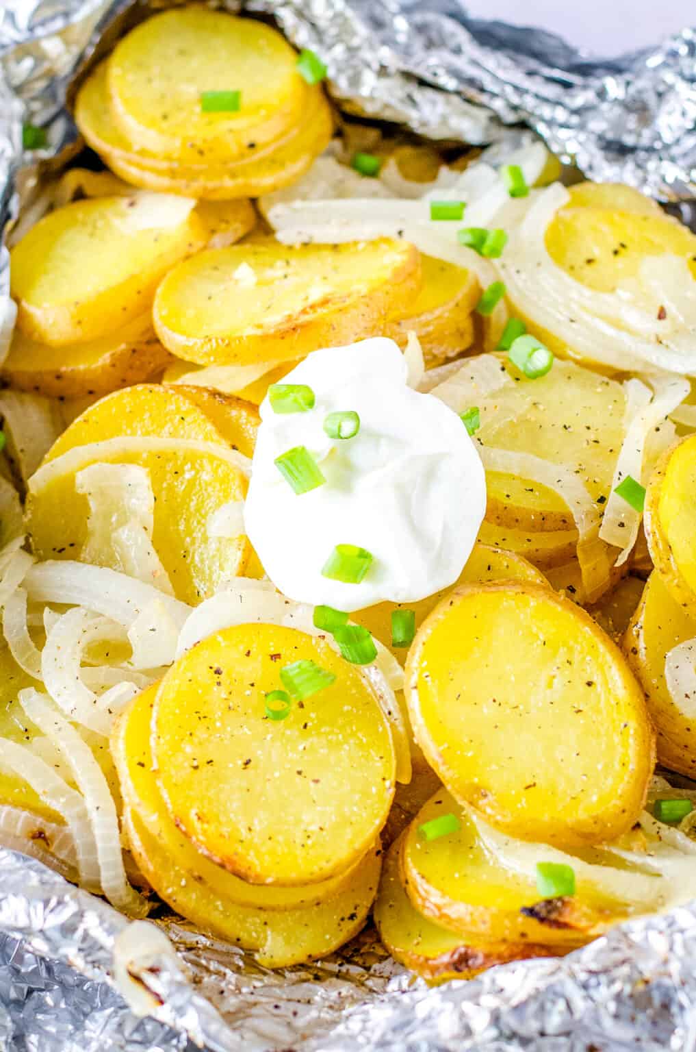 Grilled Foil Packet Potatoes with Onions! - Gimme Some Grilling