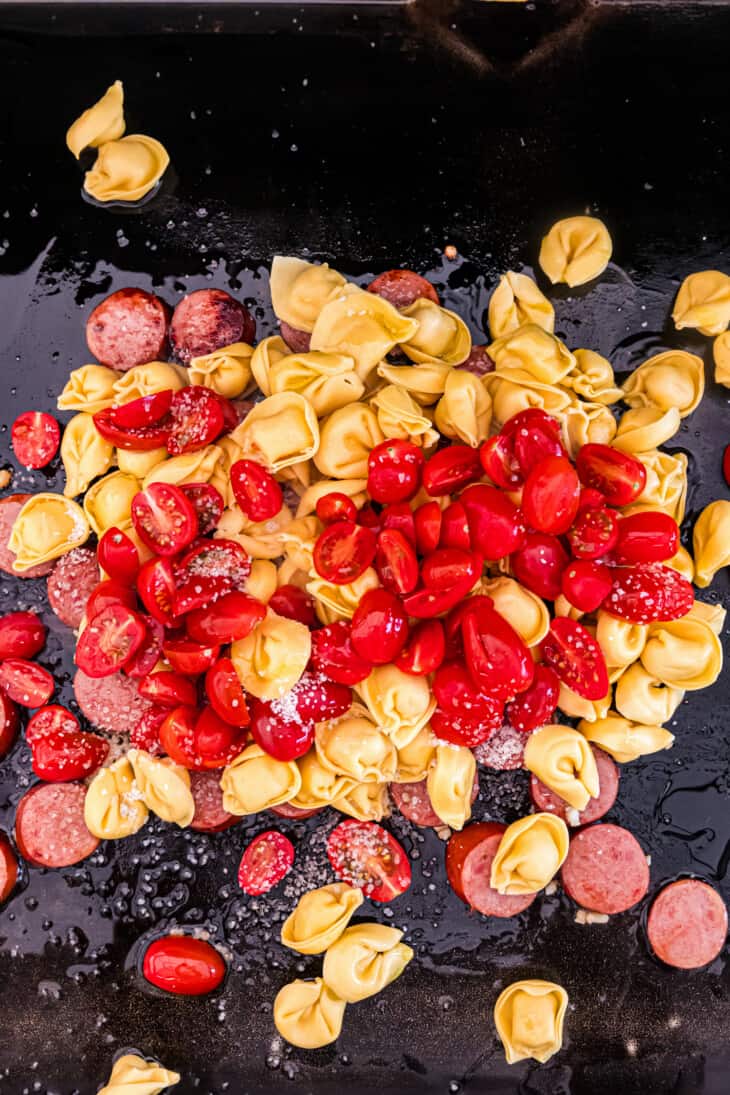 Blackstone Tortellini with Kielbasa, Spinach and Tomatoes - Gimme Some Grilling