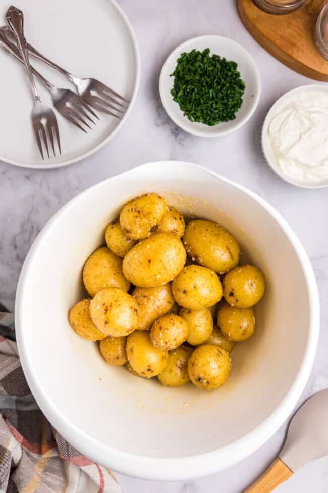 Blackstone Loaded Smashed Potatoes - Gimme Some Grilling