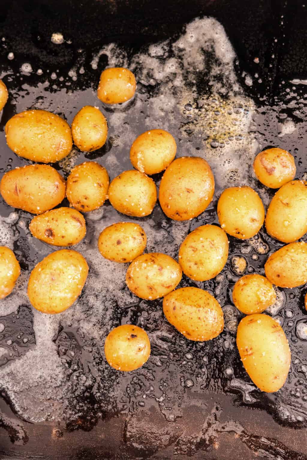 Blackstone Loaded Smashed Potatoes - Gimme Some Grilling